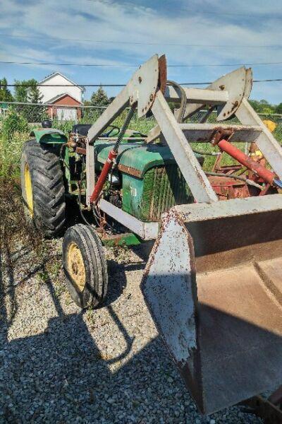 John Deere 710 tractor with loader for sale
